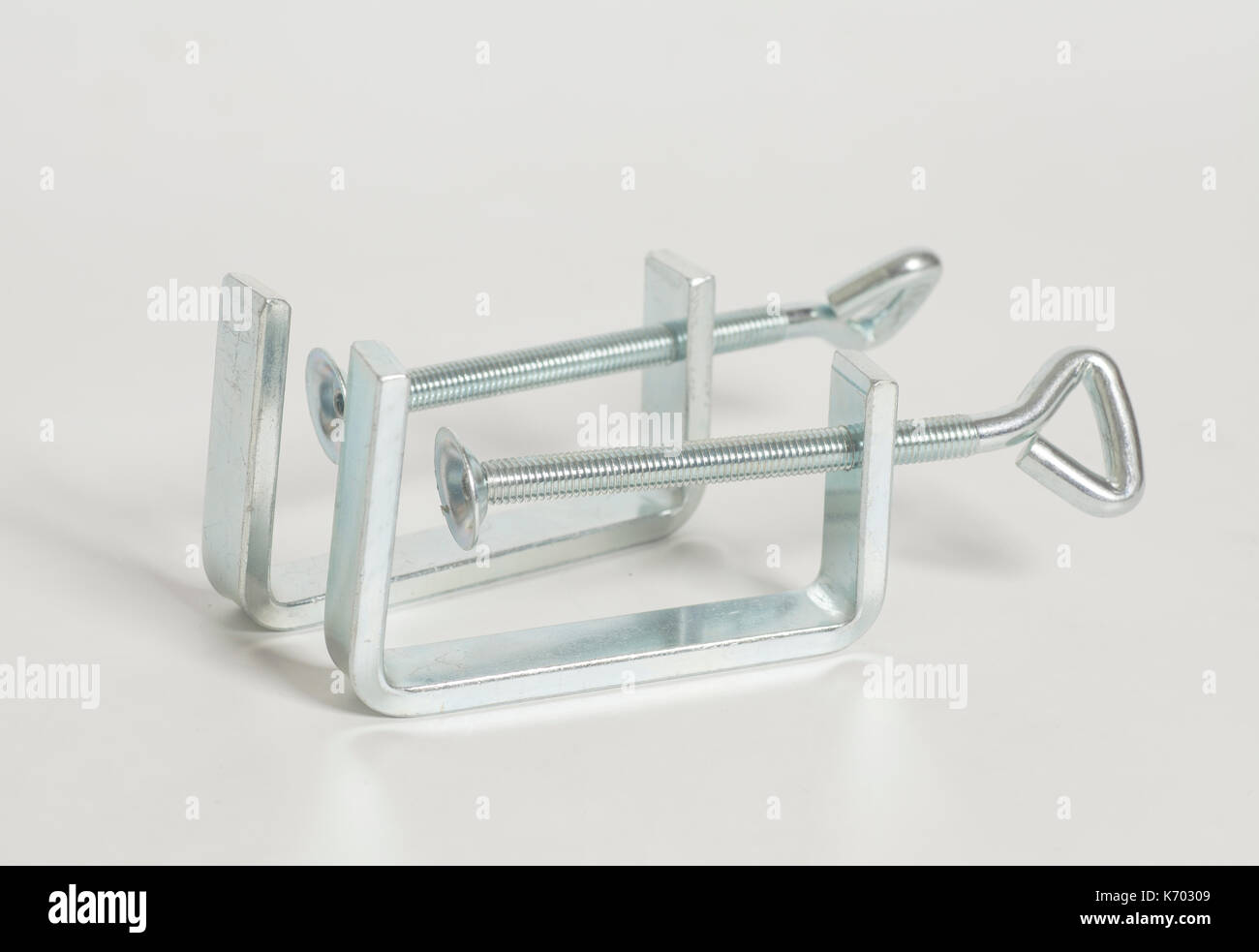 Clamp compression tool isolated on white background Stock Photo - Alamy