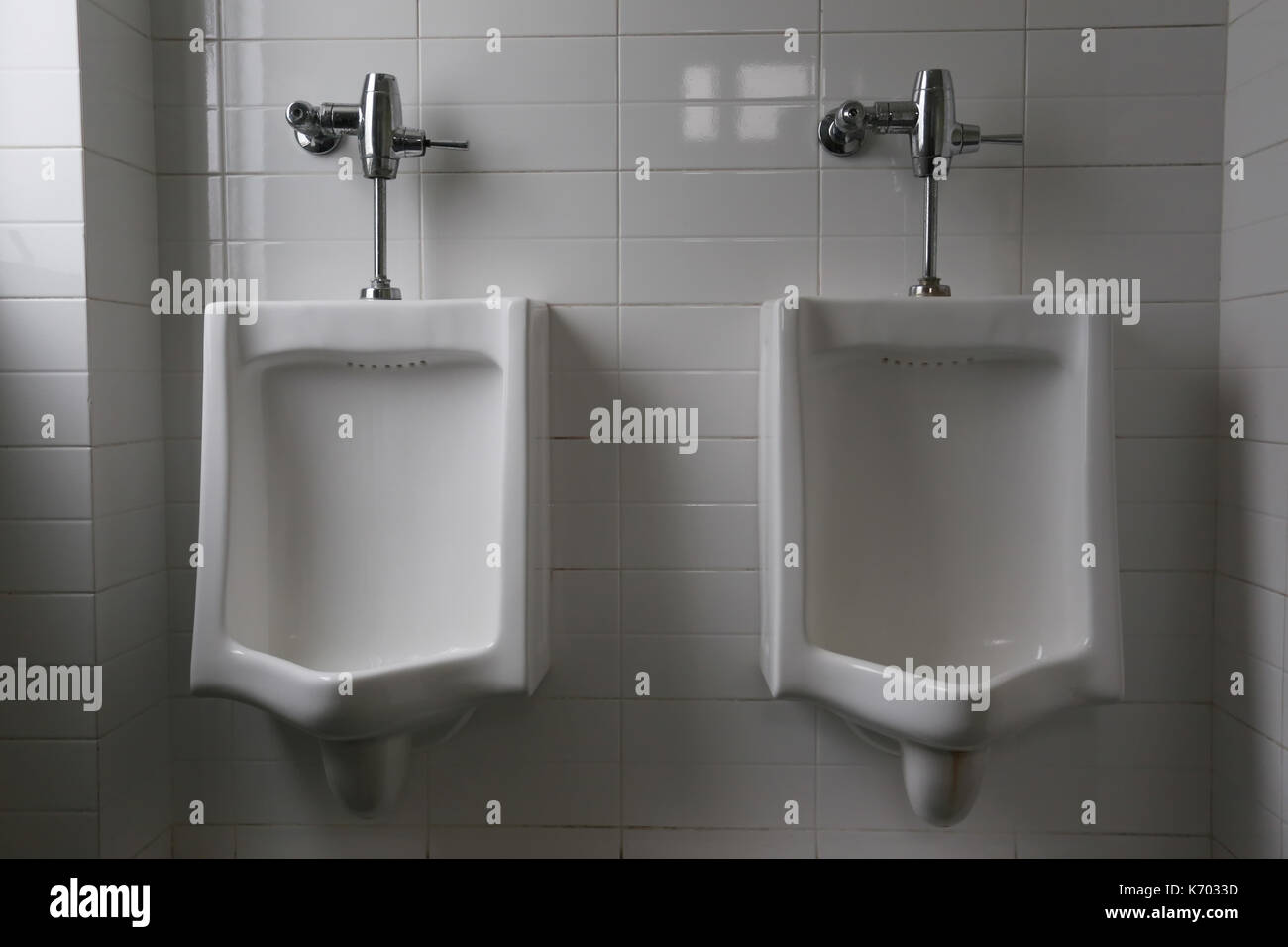 Modern urinal in men bathroom, white ceramic urinals for men in toilet ...