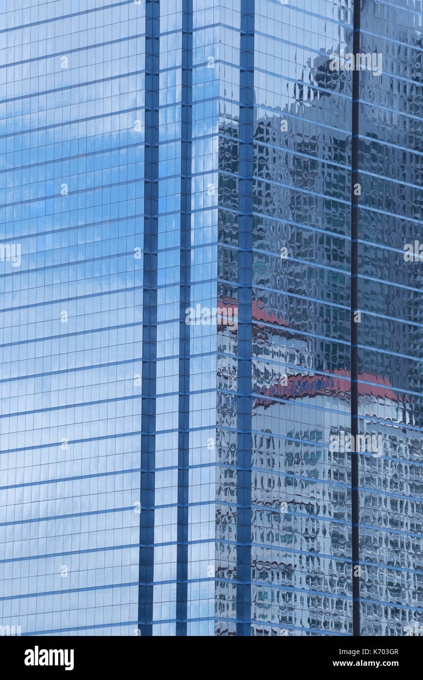 Wall of tall building or blue glass of skyscraper background for design ...