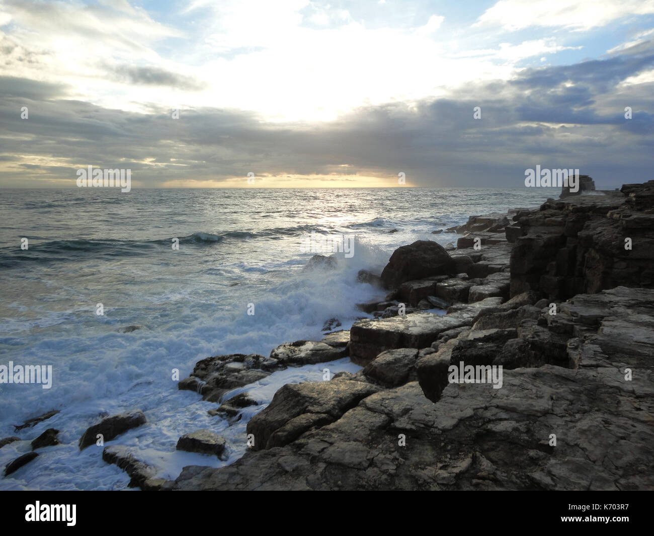 Waves crashing at Portland bill Stock Photo - Alamy