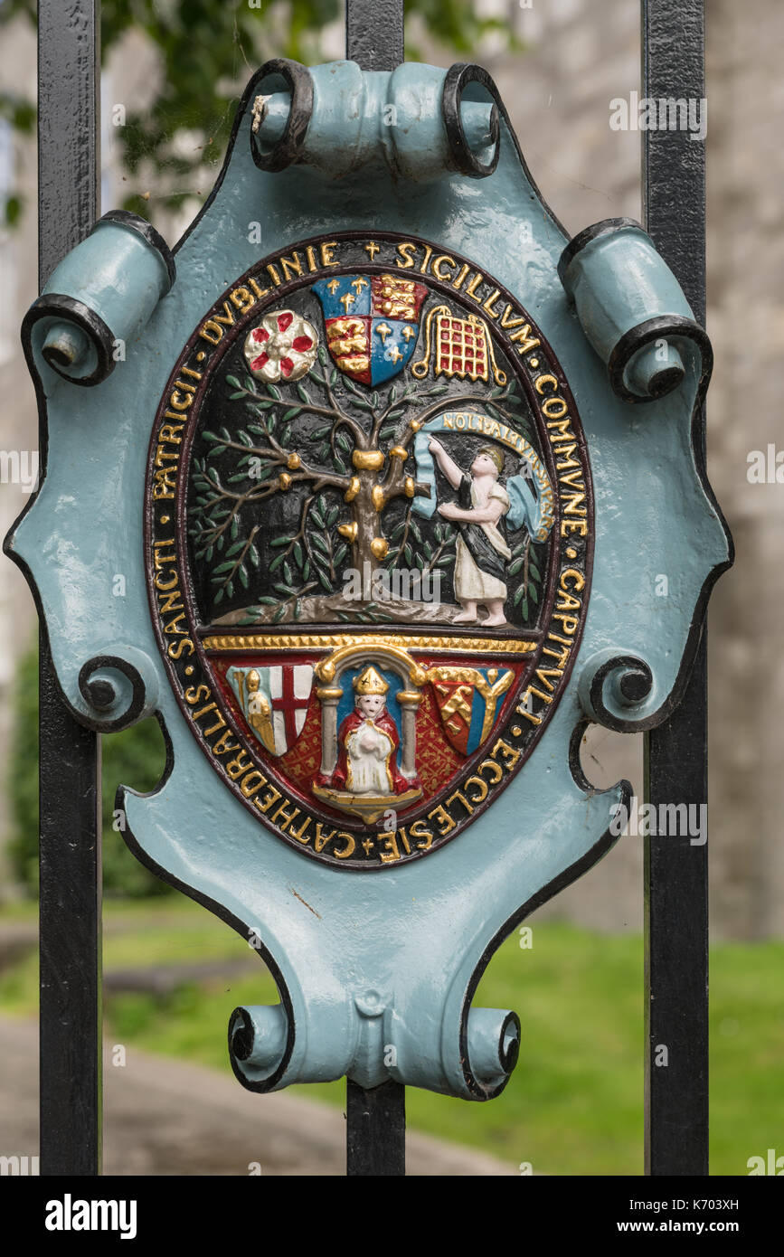Dublin, Ireland - August 7, 2017: Metal shield fixed on black fence ...