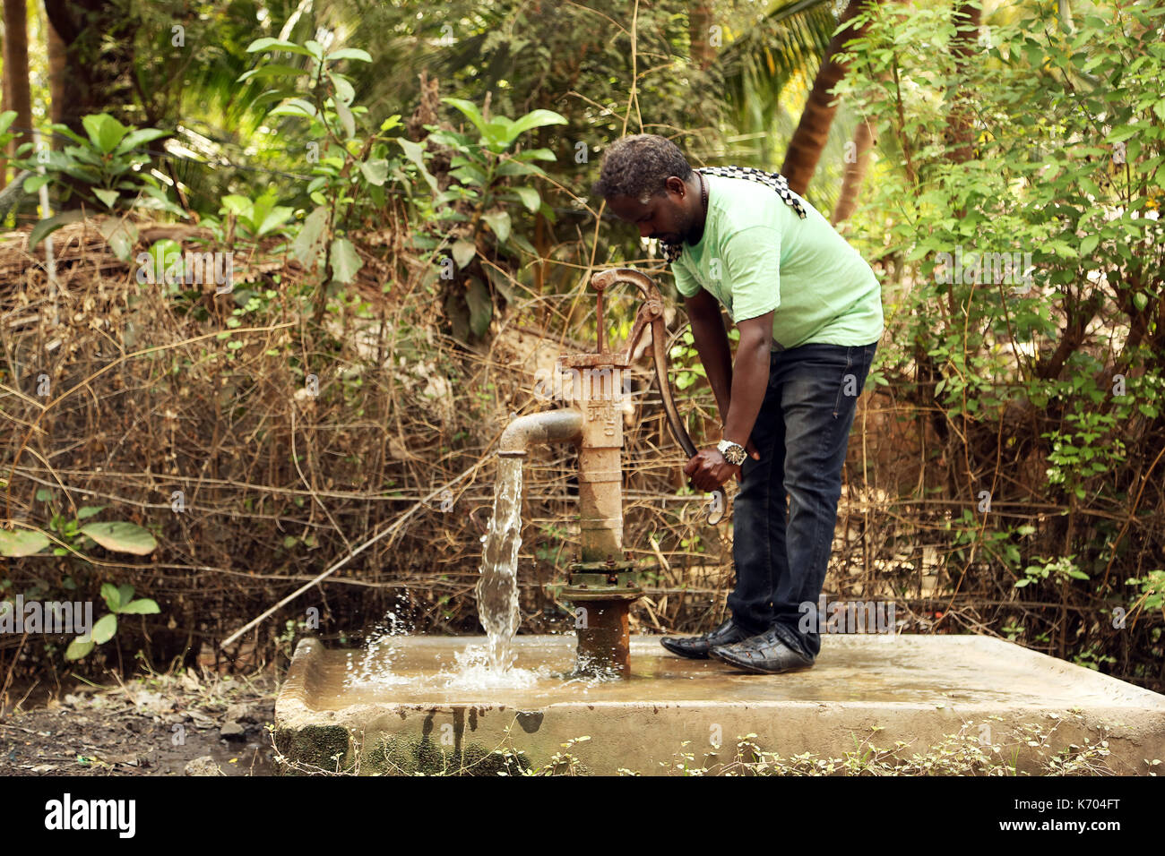 Young man water splash on face Stock Photo - Alamy