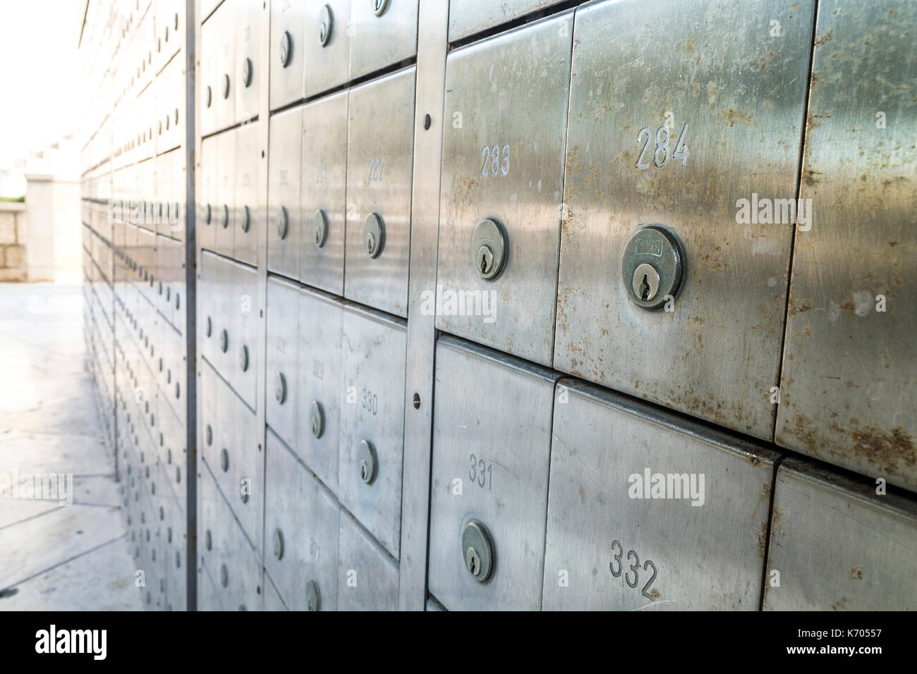 Wall of deposit safe boxes in a bank Stock Photo - Alamy