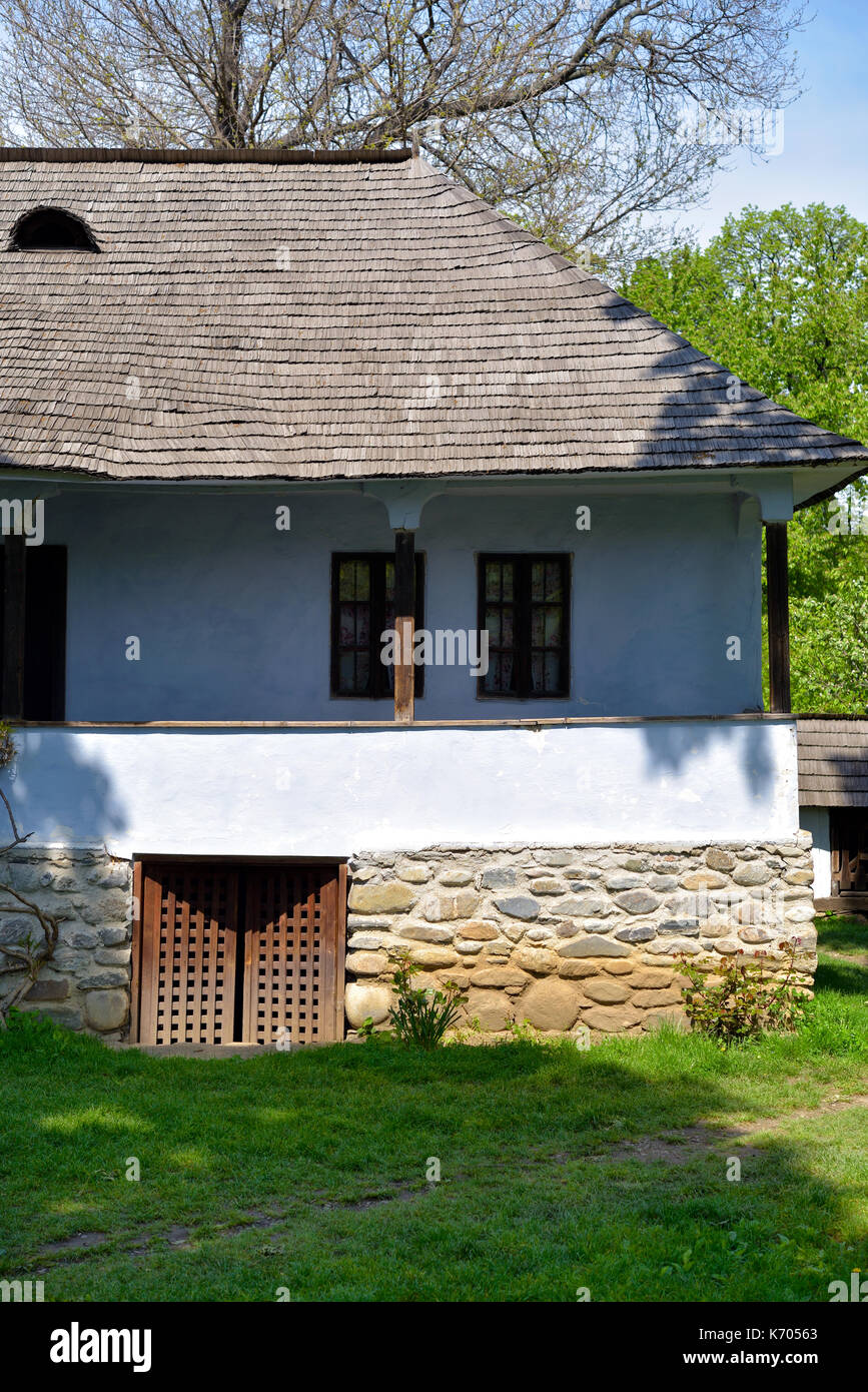 Old romanian traditional village wood and stone house Stock Photo - Alamy