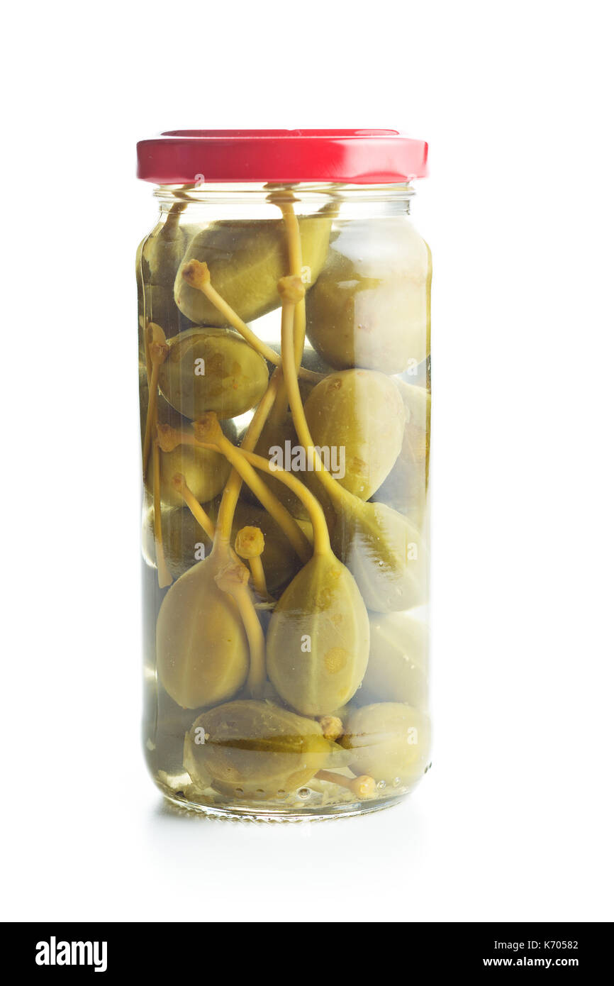 Pickled caper berries in jar isolated on white background Stock Photo ...
