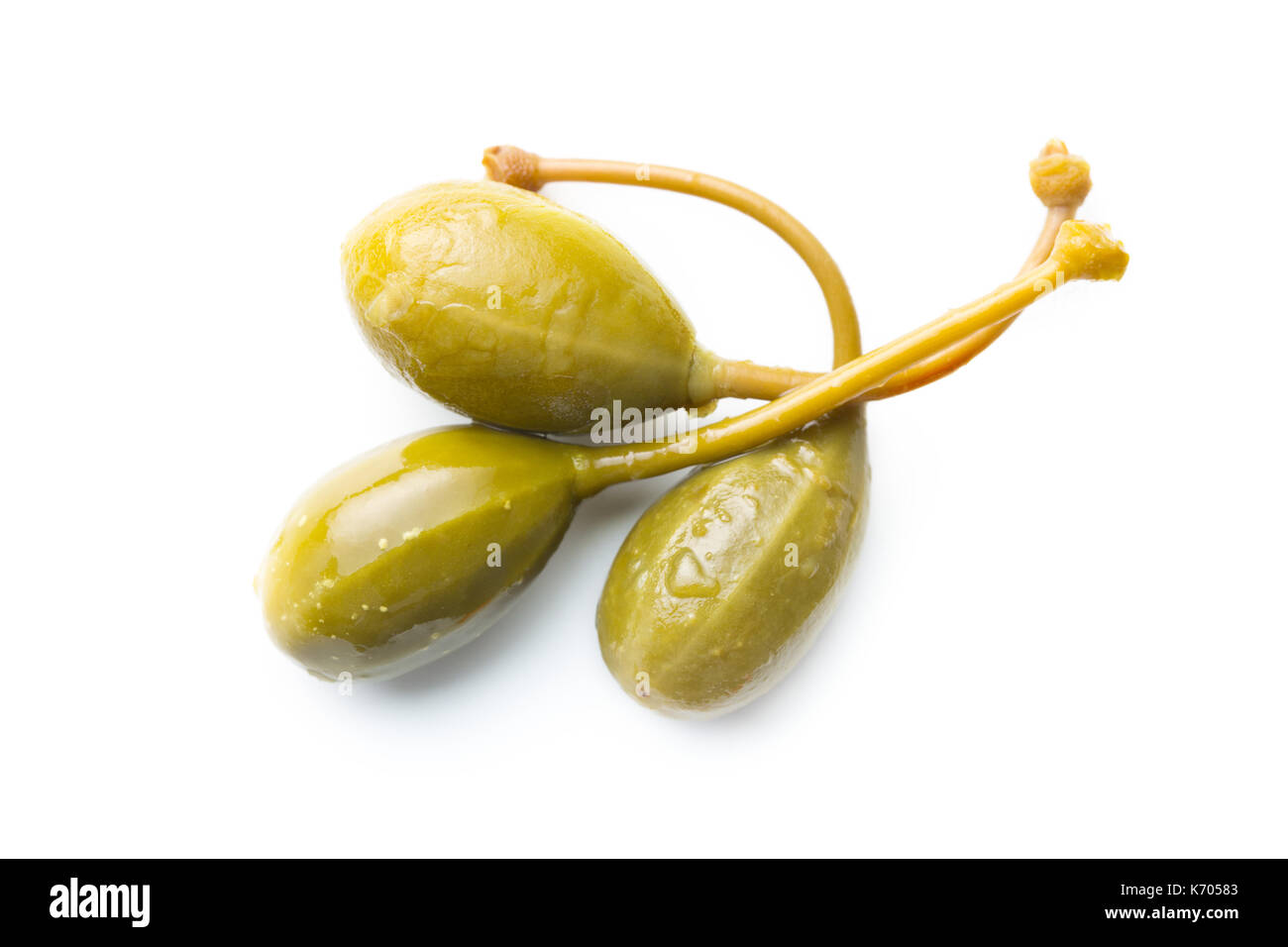 Pickled caper berries isolated on white background Stock Photo - Alamy