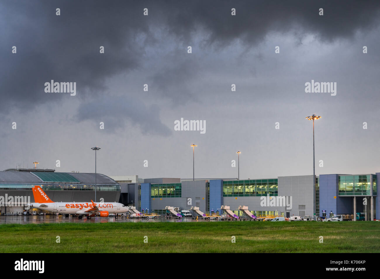 Dramatic storm clouds over Luton Airport (LTN) with an Easyjet plane on ...