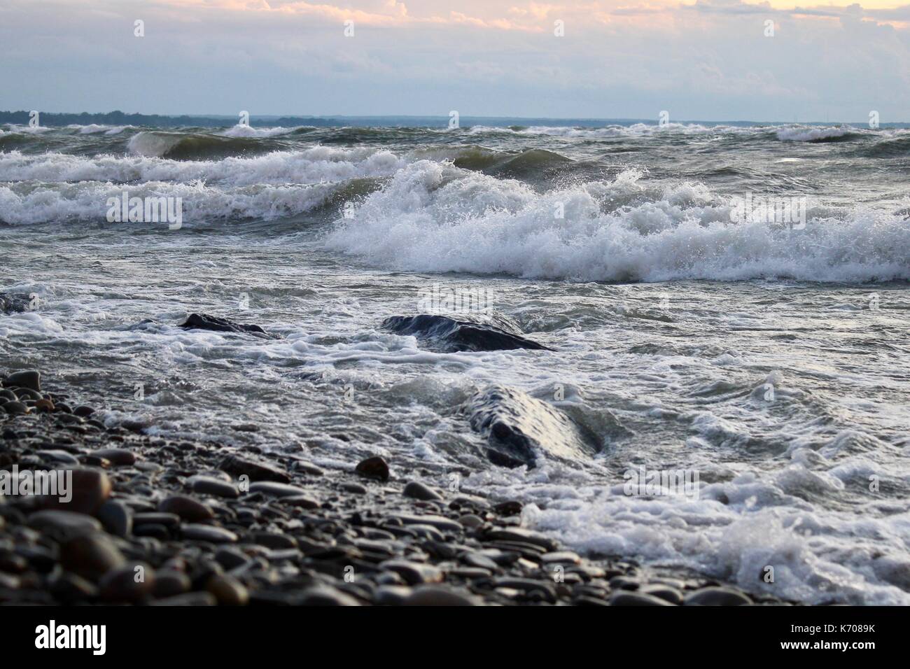 Water rolling over rocks hi-res stock photography and images - Alamy