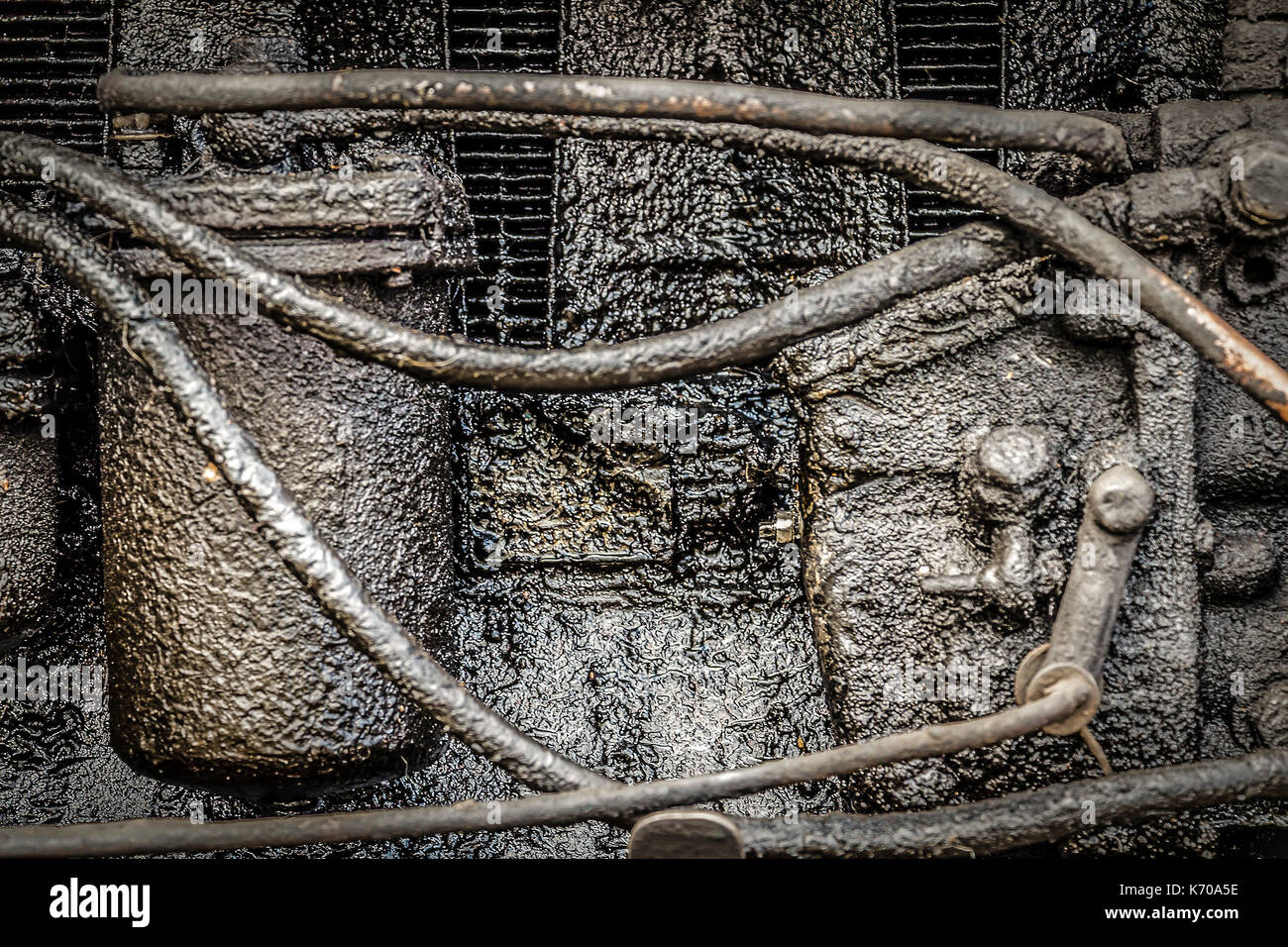 Old, very dirty, rusty diesel engine closeup Stock Photo - Alamy