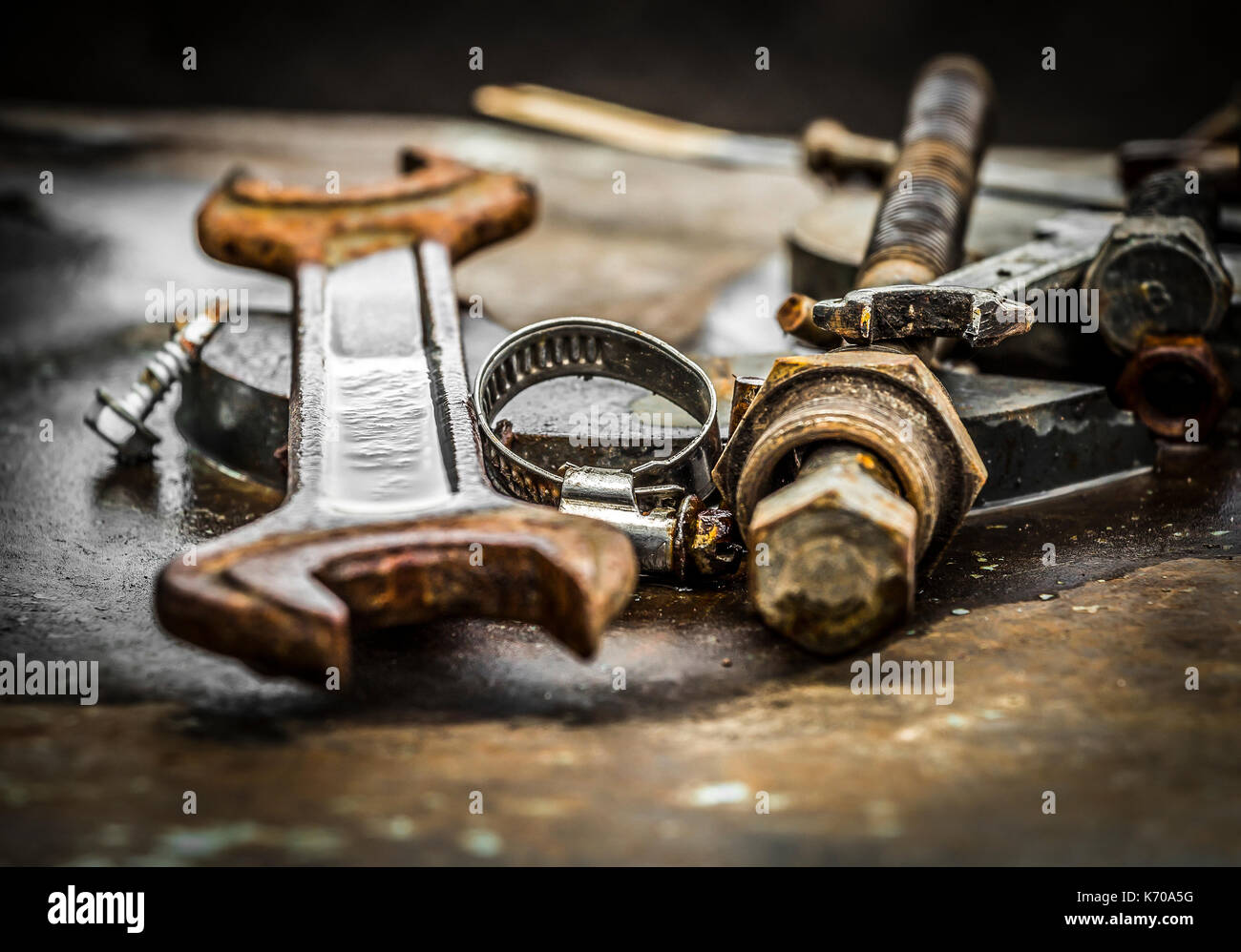Old rusty parts and tools for repair of machinery Stock Photo - Alamy