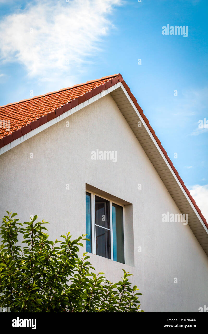 The upper part of the house. Roof, inspection windows, chimney Stock ...