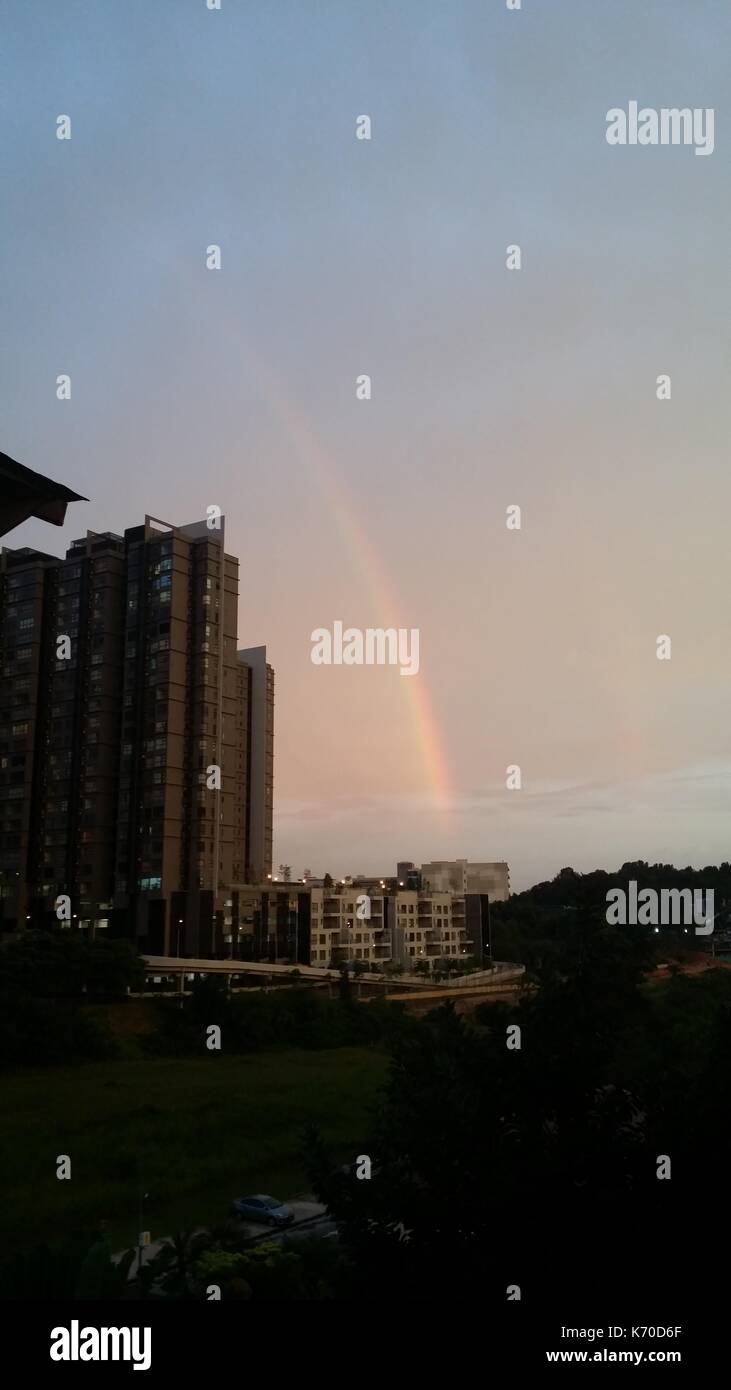 Rainbow at Dusk Stock Photo - Alamy