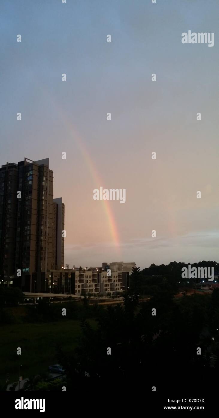 Rainbow at Dusk Stock Photo - Alamy