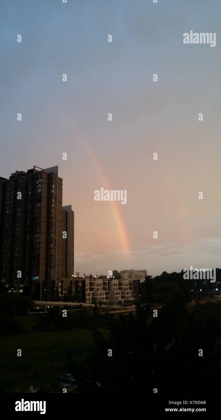Rainbow at Dusk Stock Photo - Alamy