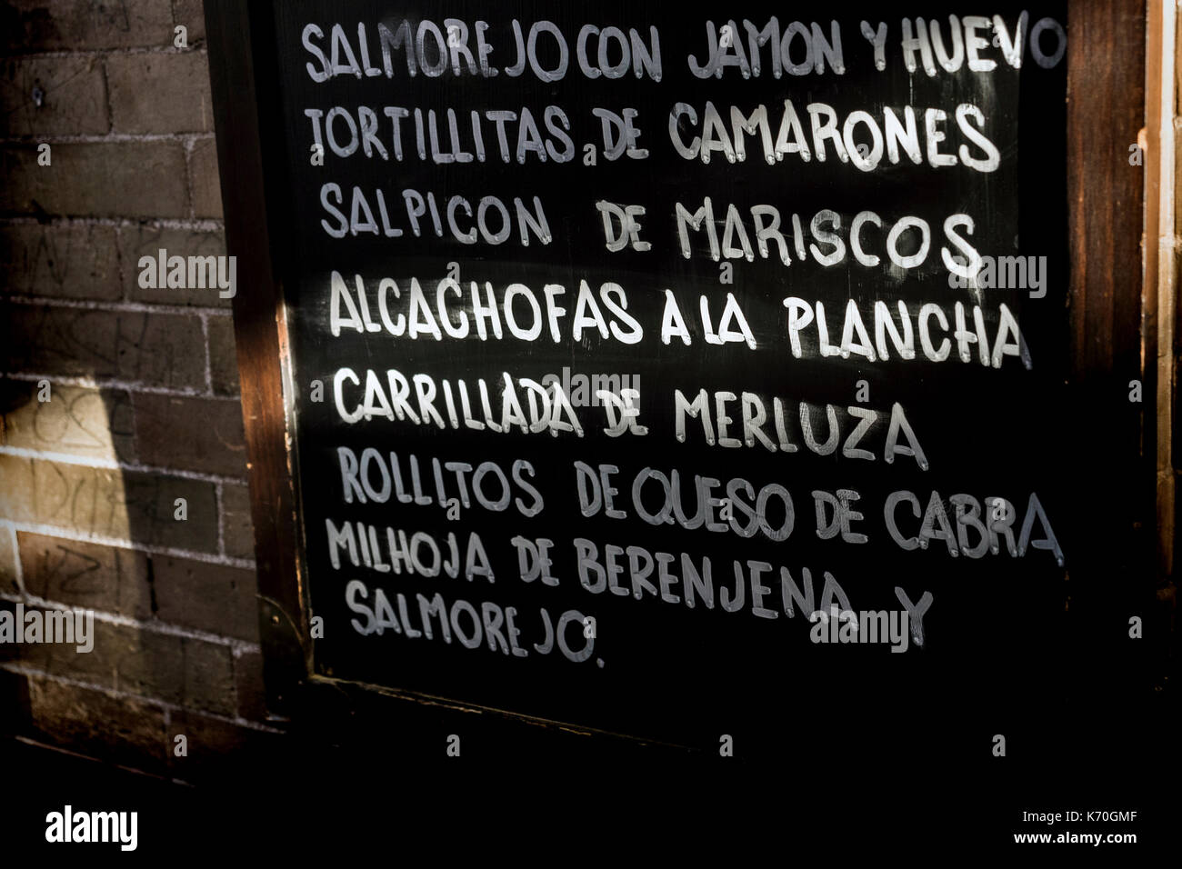 Traditional Andalusian food, slate written typical dishes Meditarranea ...