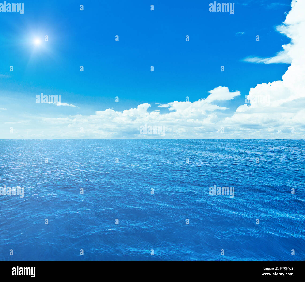 Blue cloudy sea hi-res stock photography and images - Alamy
