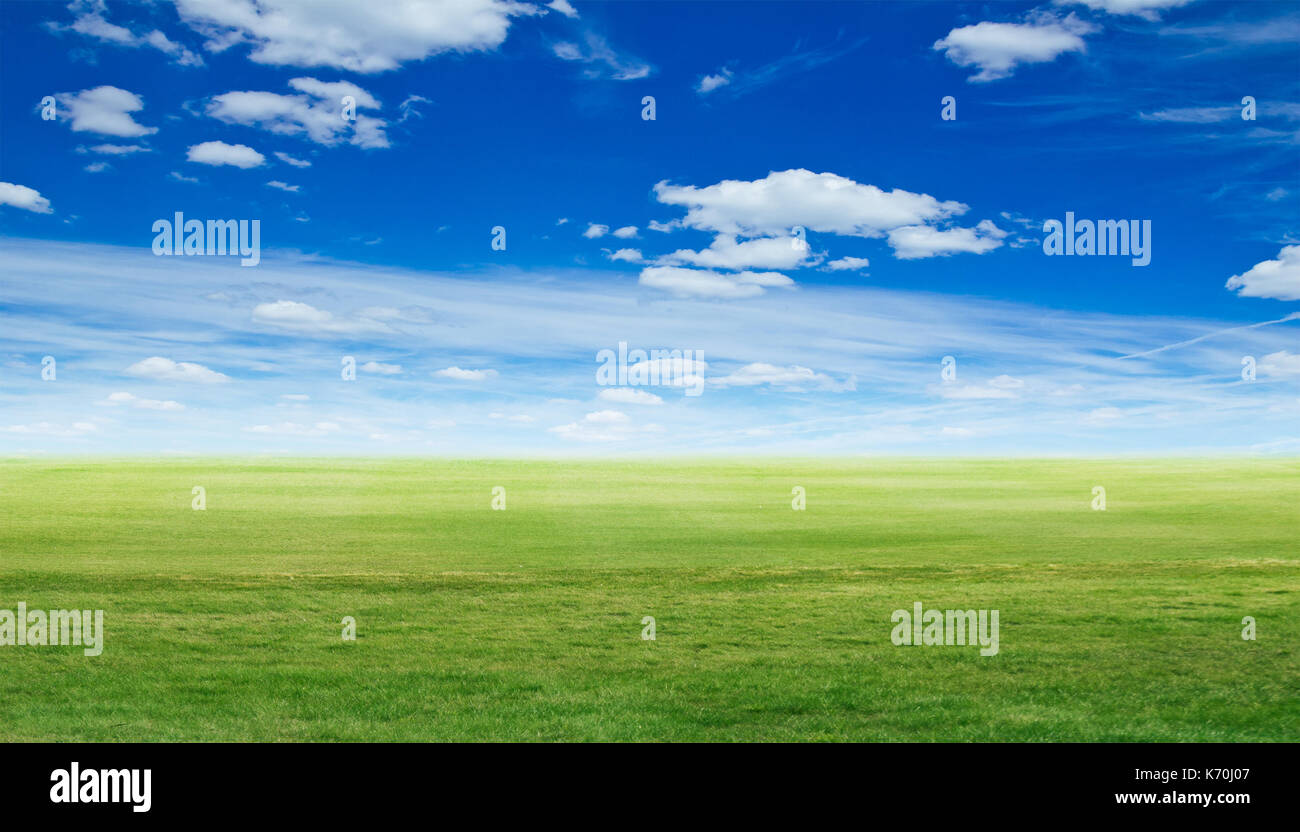 Panoramic landscape with green meadow and cloudy sky hi-res stock ...