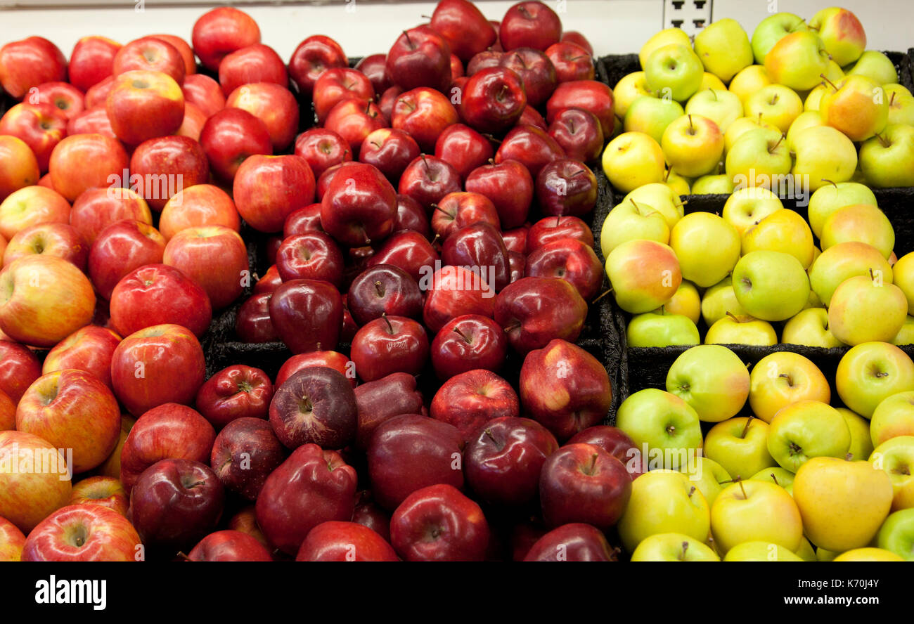 a variety of apple types and shapes at the supermarket Stock Photo - Alamy