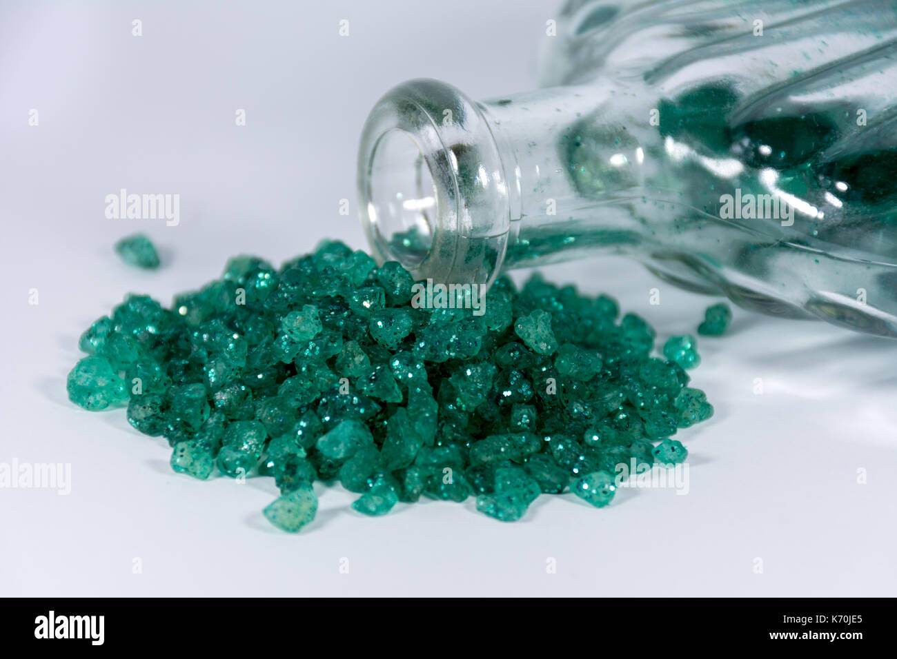 Scented bath salts sea turquoise color bottle Stock Photo - Alamy