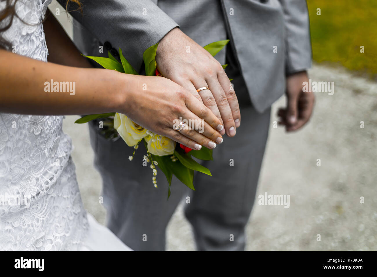 Newly wed couple's hands with wedding rings Stock Photo - Alamy