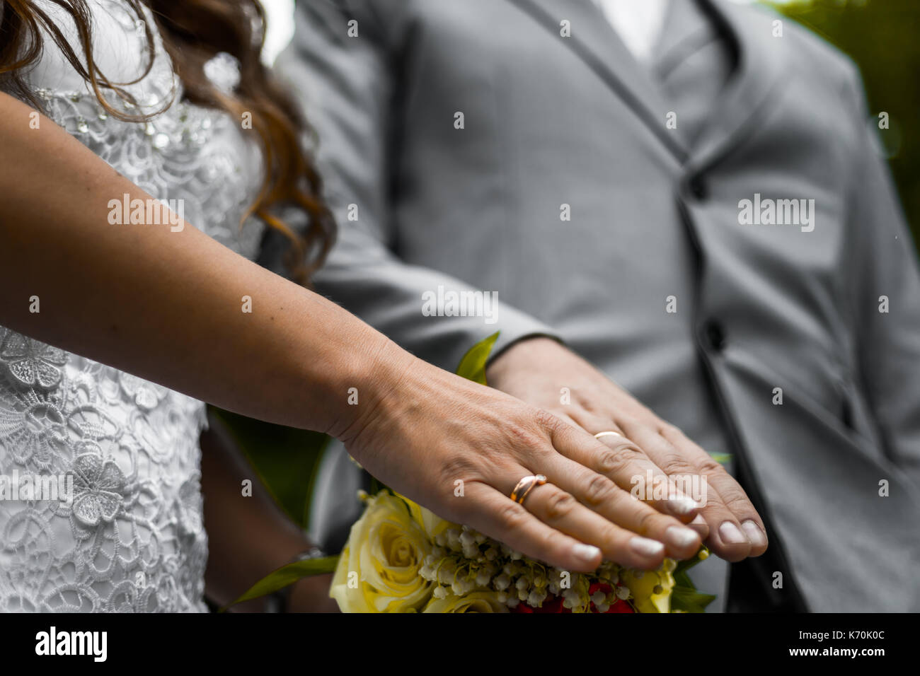 Newly wed couple's hands with wedding rings Stock Photo - Alamy