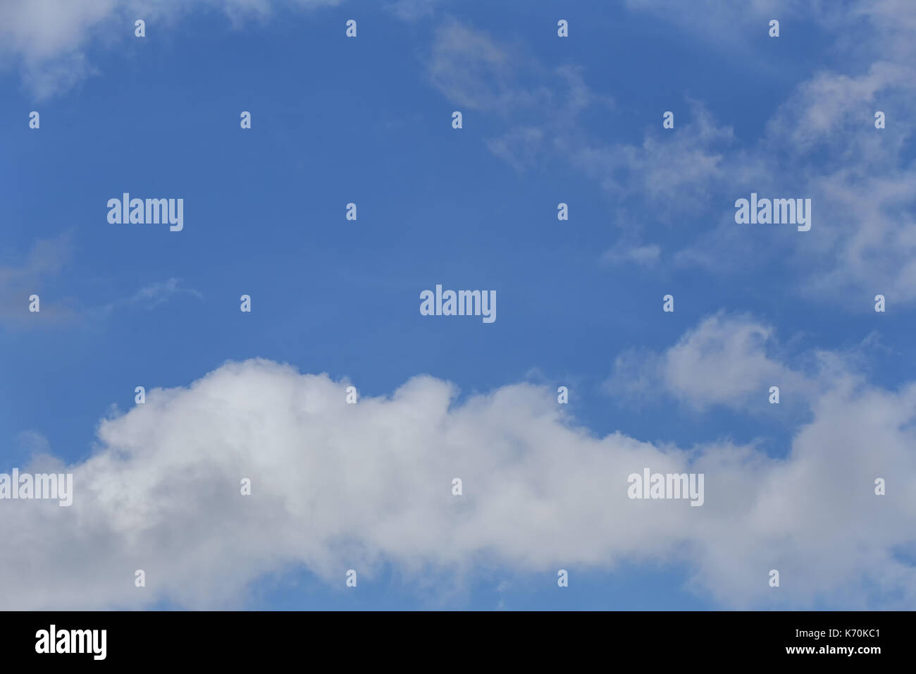 Blue sky with bright white clouds in daylight for design in you work of ...