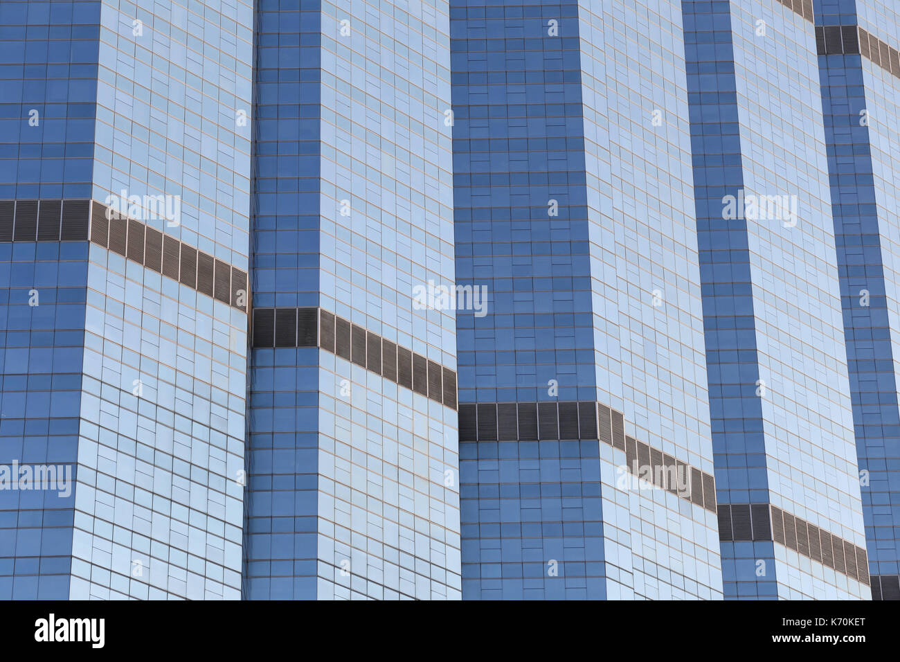 Wall of tall building or glass of skyscraper background for design in ...