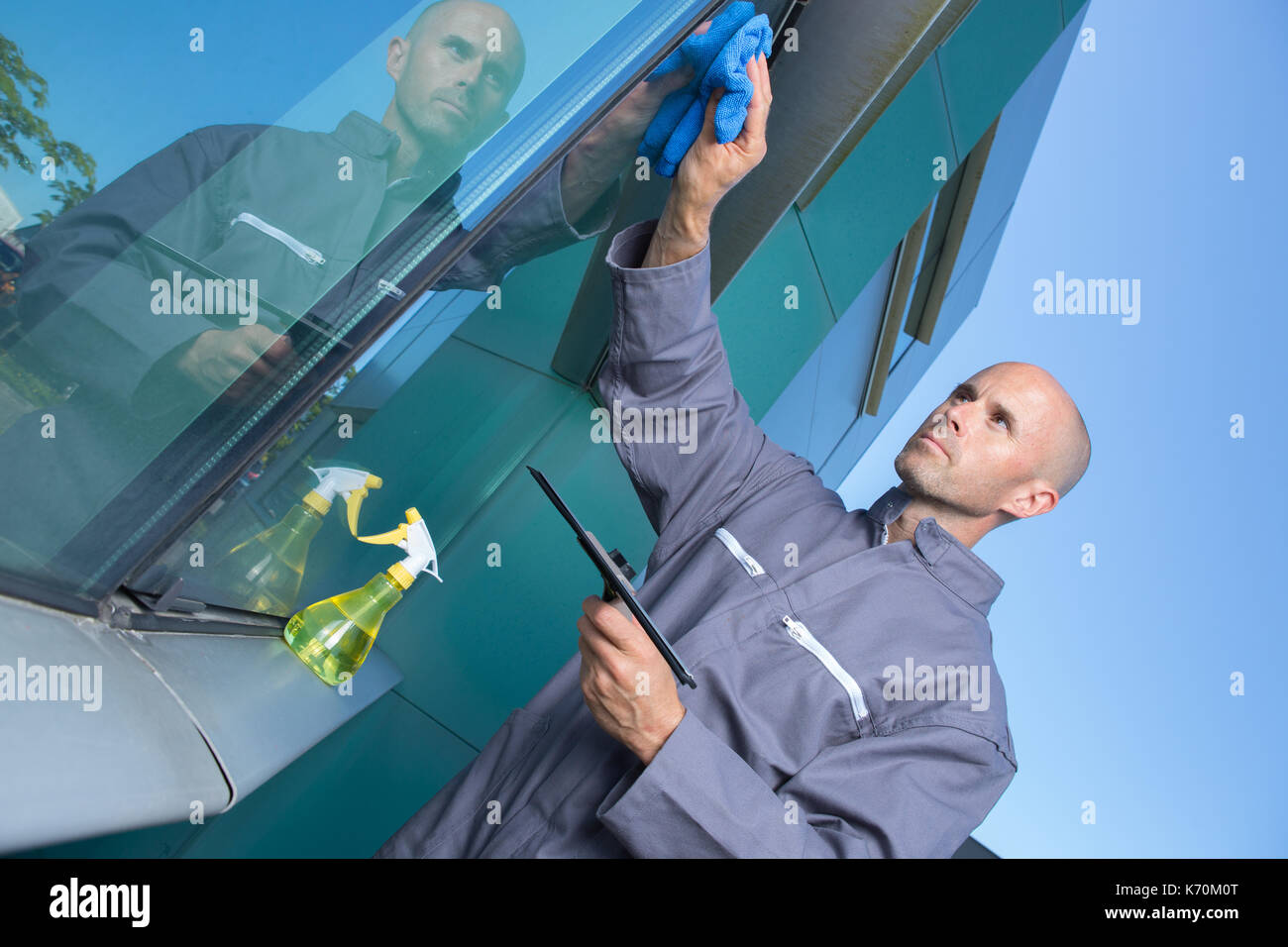 wiping the glass window Stock Photo - Alamy