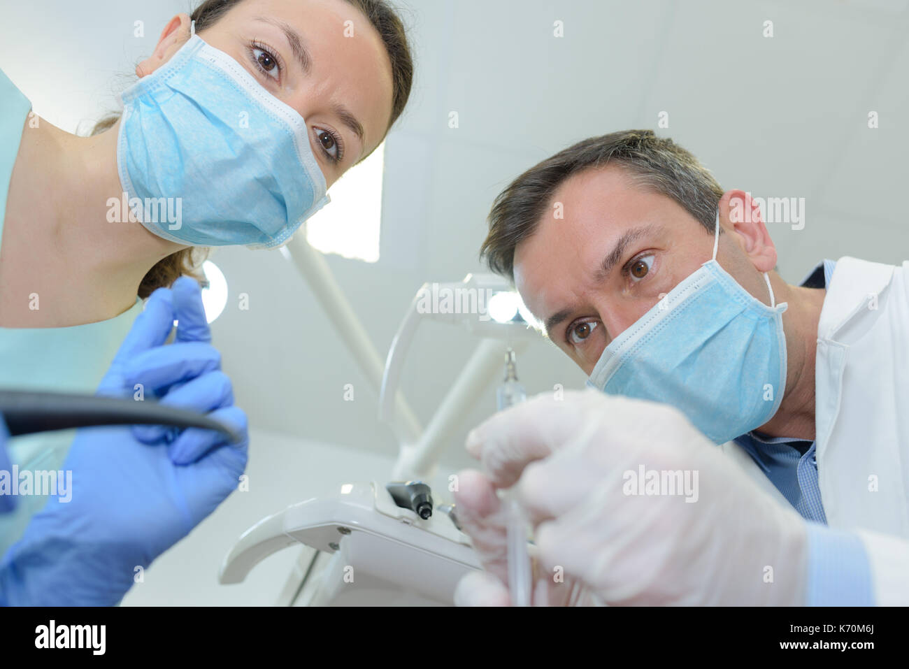 the dentist doing his work Stock Photo - Alamy