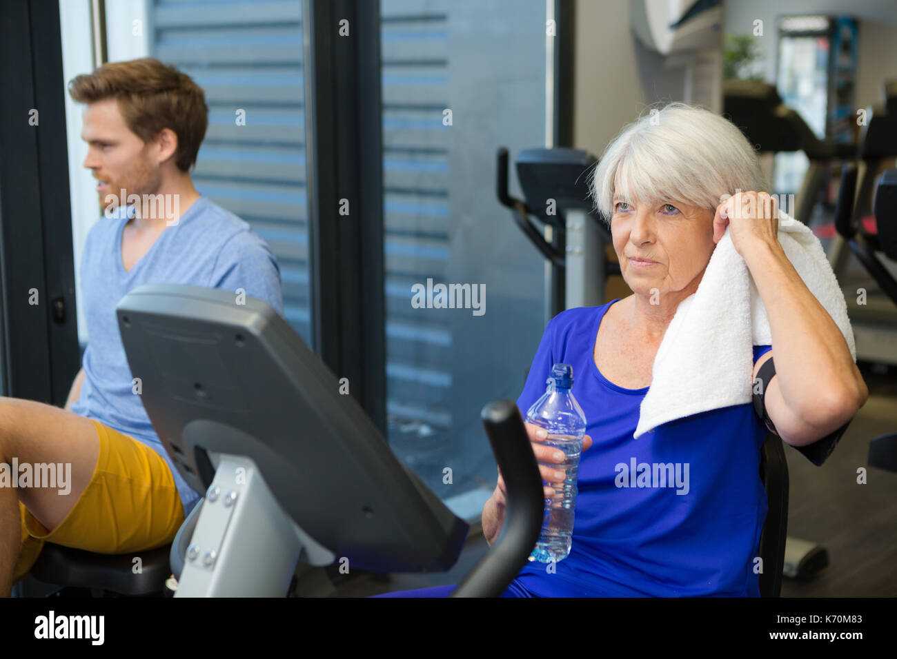 elderly woman on the exercise machine Stock Photo - Alamy