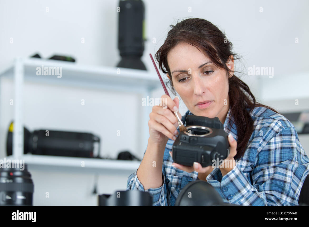Cameras cleaning hi-res stock photography and images - Alamy