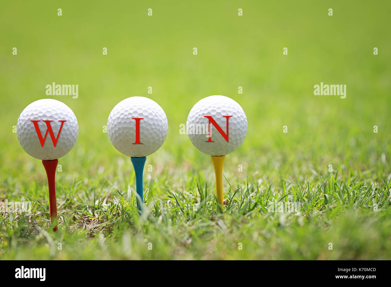 The red letter of Win on white Golf ball for design in your work or ...