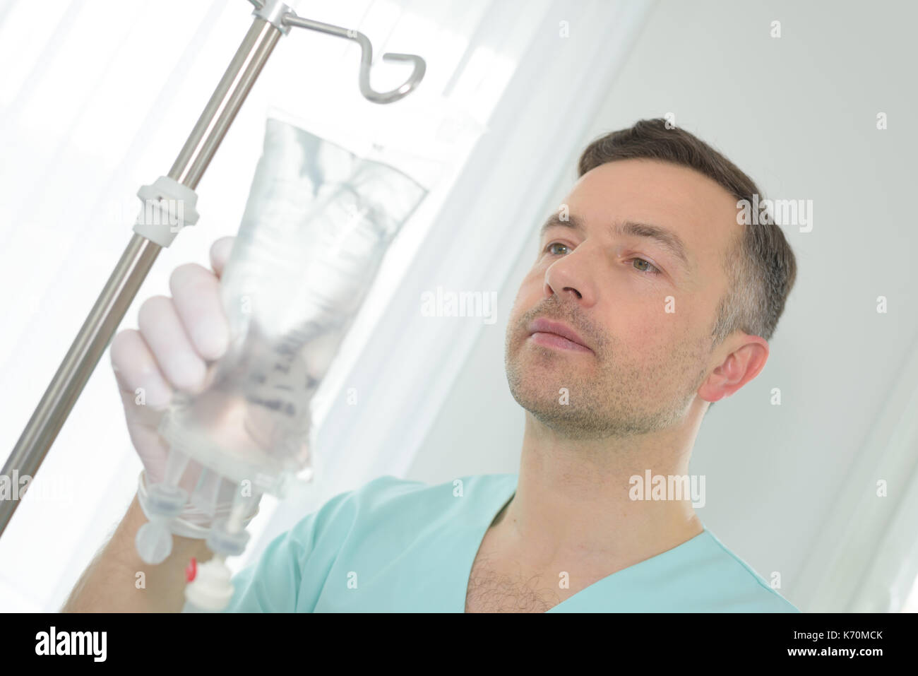 doctor checking drip Stock Photo - Alamy
