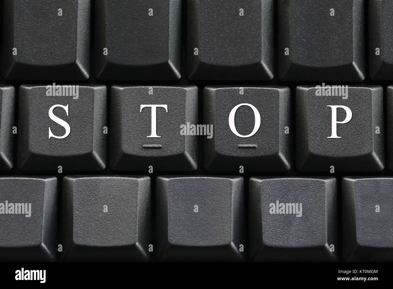 The white letter of Stop on computer keyboard background for design in ...