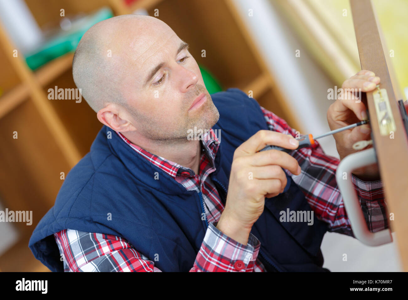 mending the door Stock Photo - Alamy