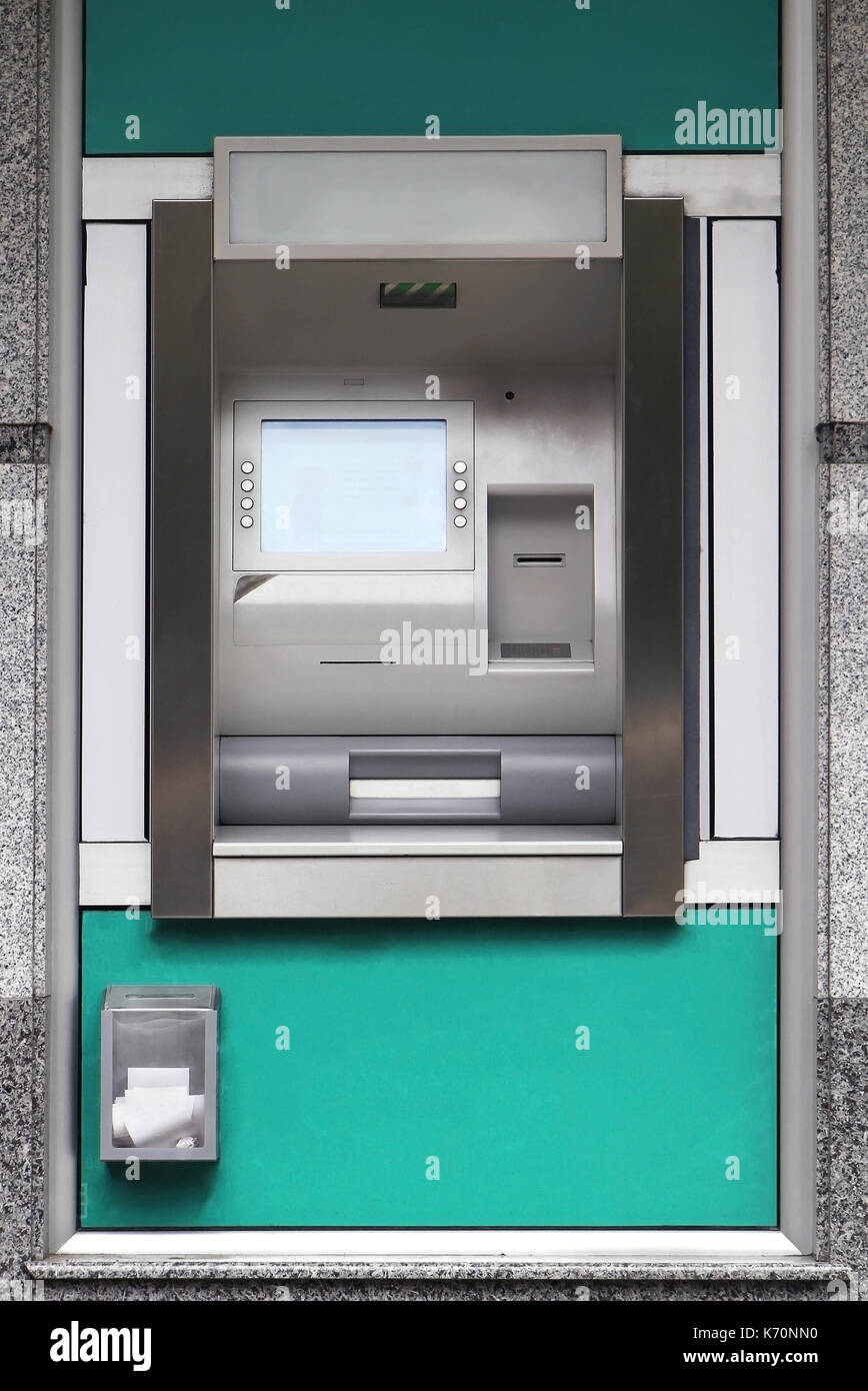 Cash machine on facade of urban building Stock Photo - Alamy