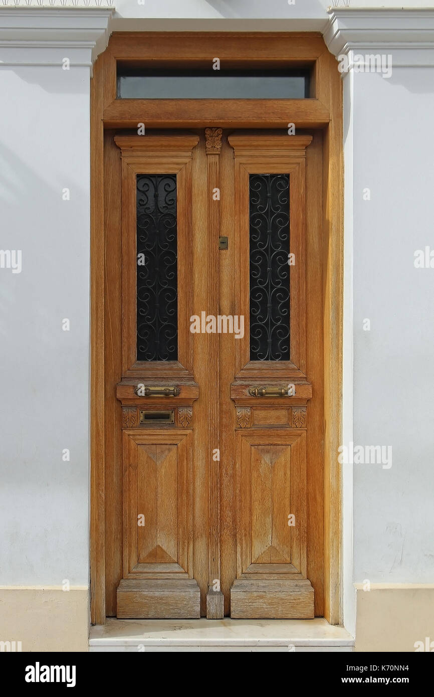 Wooden closed entrance door on old building Stock Photo - Alamy