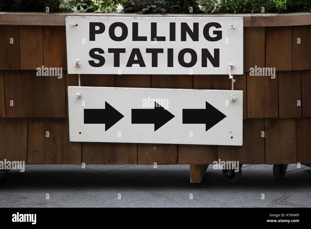 Polling station sign with arrows directing people where to go Stock ...