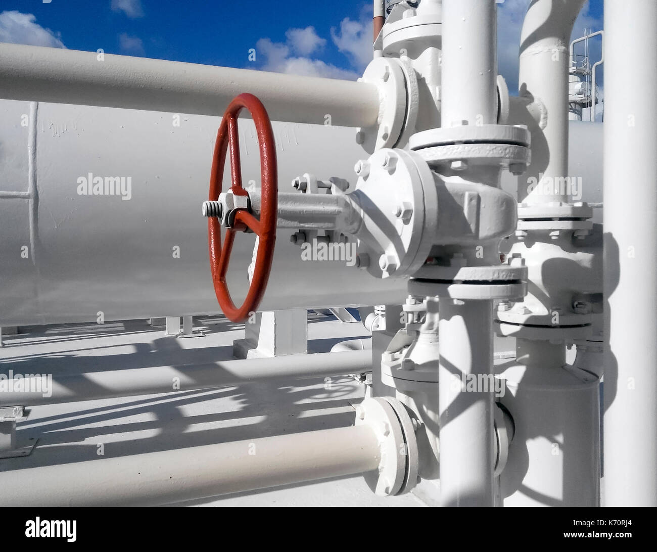 Latch on the pipeline. Equipment for primary oil refining Stock Photo ...