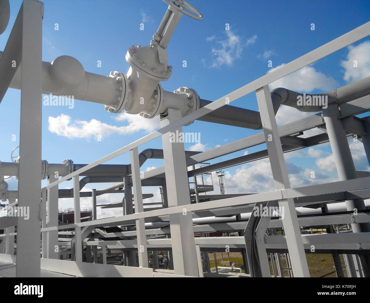 Latch on the pipeline. Oil refinery. Equipment for primary oil refining ...