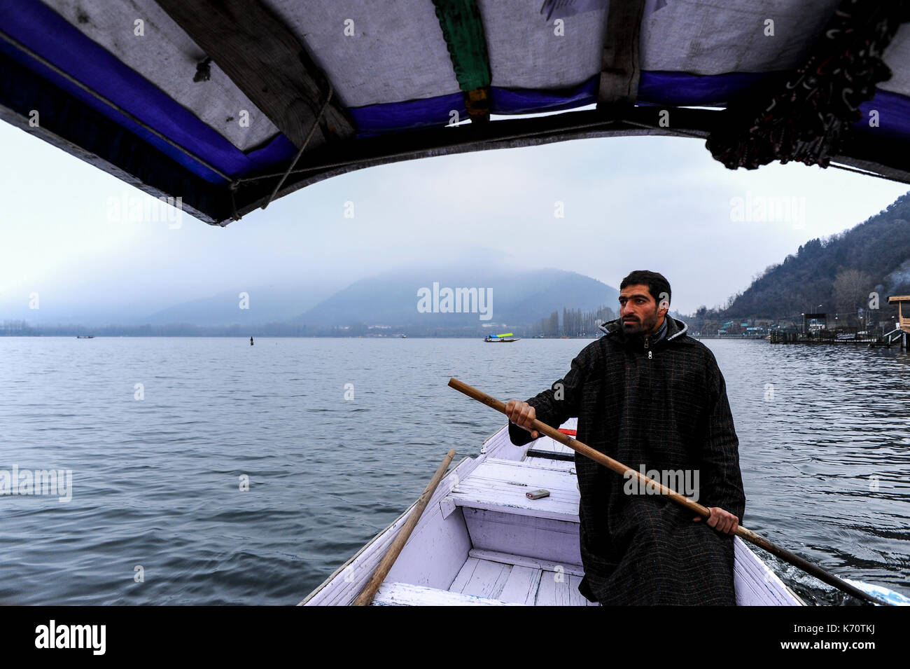 Shikara boat in Dal Lake Kashmir. Riding the boat is one of the ...