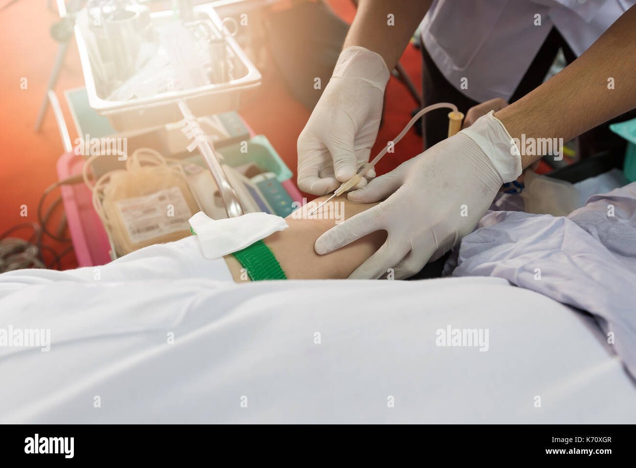 Nurse receiving blood from blood donor in hospital Stock Photo - Alamy