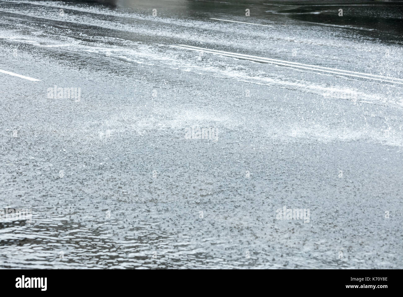 background made from heavy rain and cars driving on flooded road Stock ...