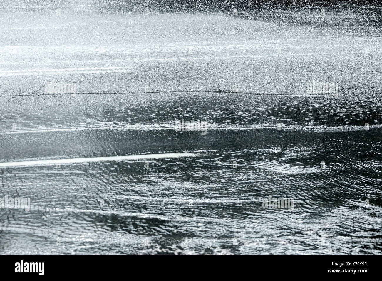 splash by a car on flooded road during heavy rain Stock Photo - Alamy