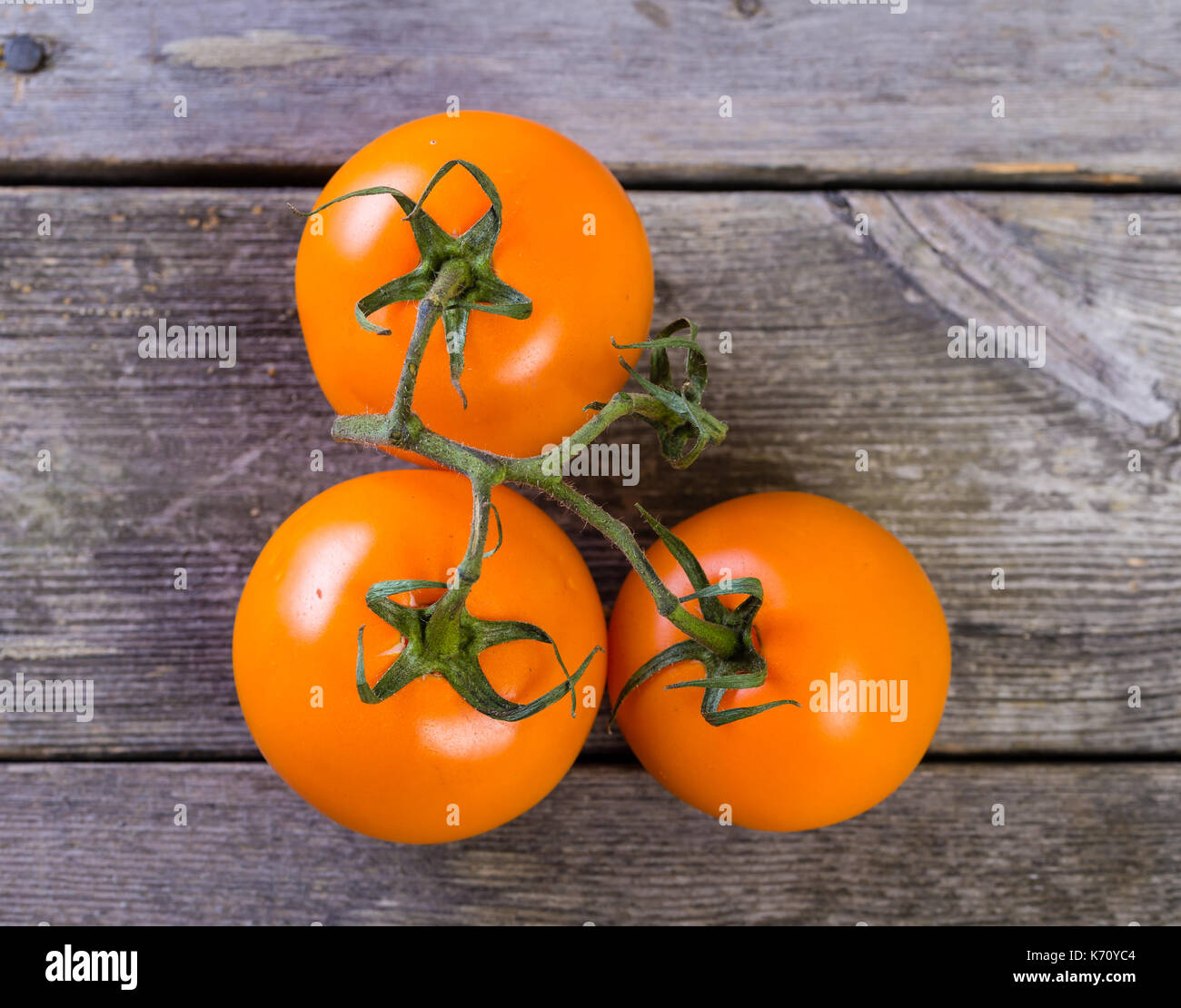 Orange color tomatoes hi-res stock photography and images - Alamy