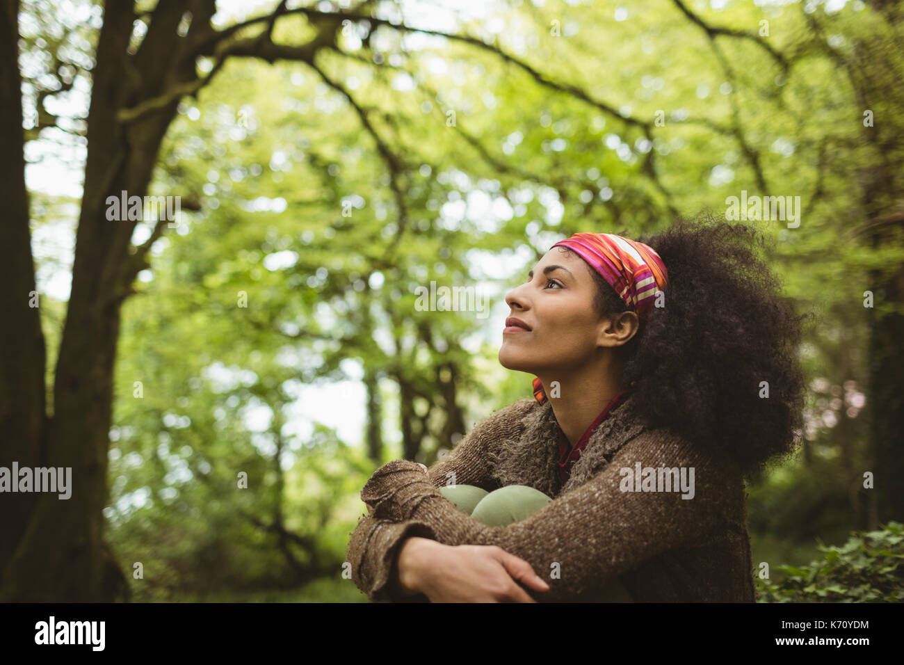 Young woman hugging tree in woodland hi-res stock photography and ...