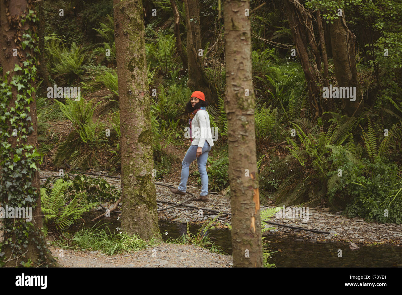 Young woman hugging tree in woodland hi-res stock photography and ...