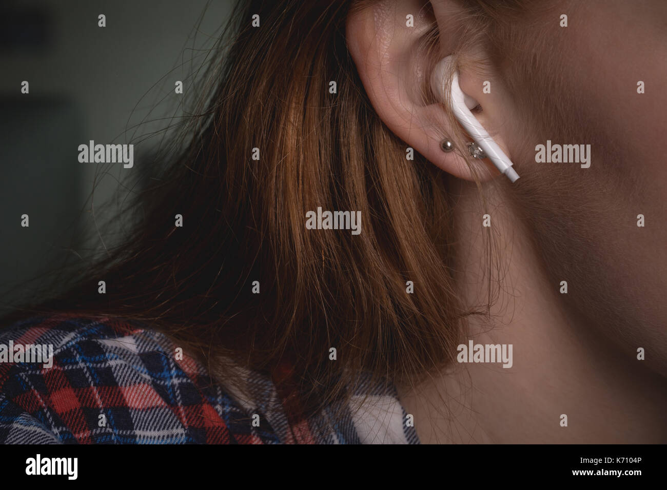 Close up woman listening hi-res stock photography and images - Alamy