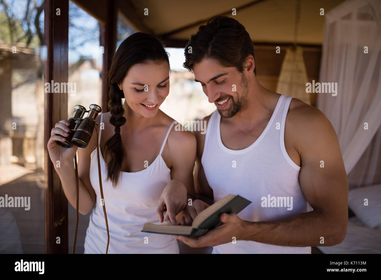 Lifestyle young couple binoculars hi-res stock photography and images ...