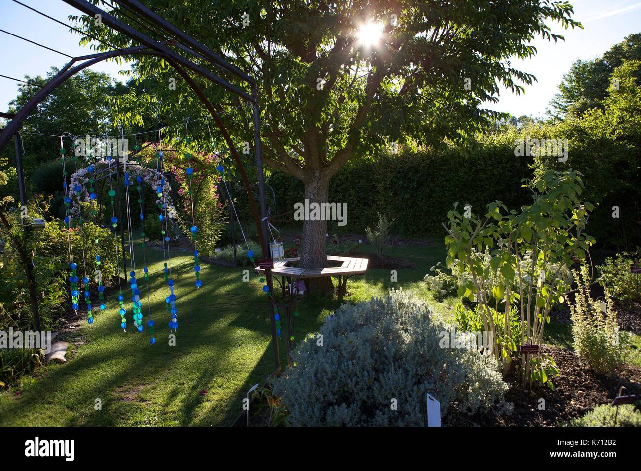 France, Alpes de Haute Provence, Mane, Abbey of Salagon A lush greenery ...